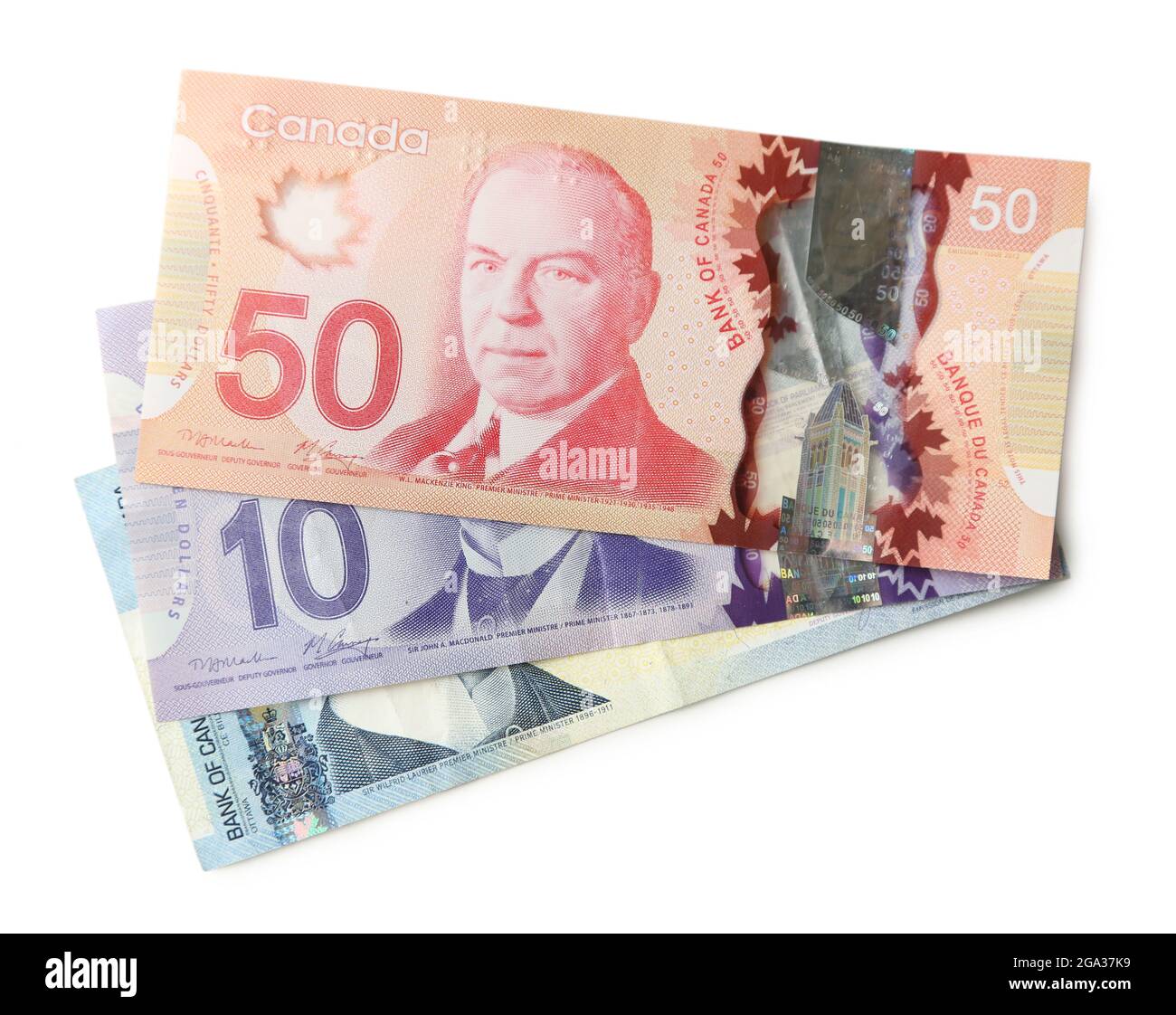 Canadian dollars, isolated on white Stock Photo - Alamy