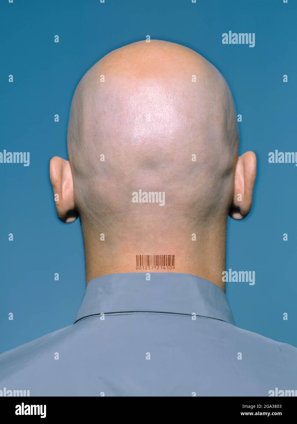 Man with barcode on the back of the neck, symbolizing human ...