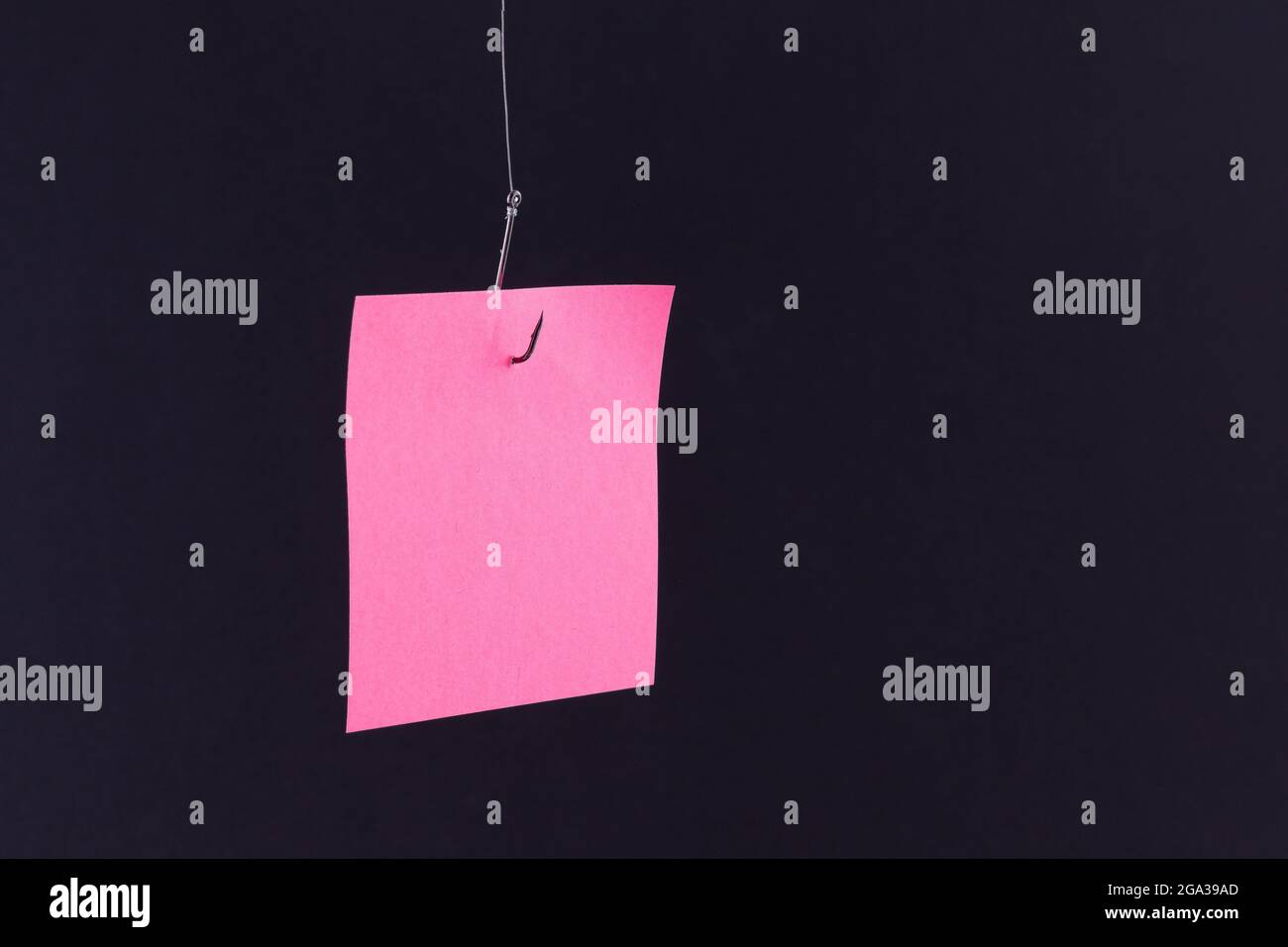 Mockup of a Blank Pink Memo Paper with Copy Space Hanging on a Fishing ...