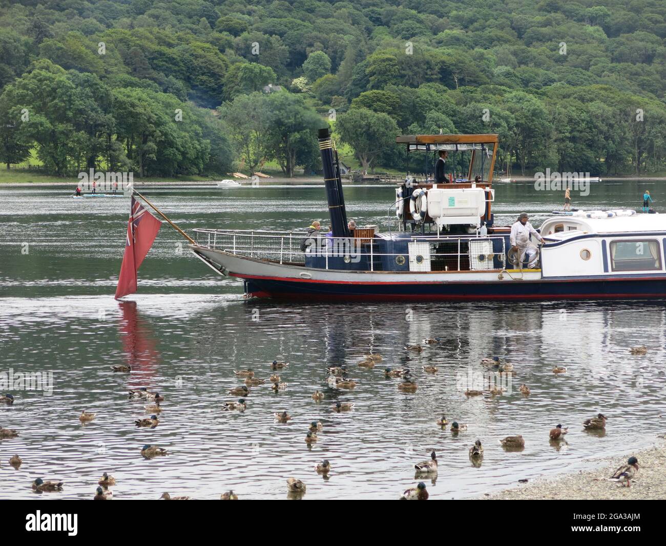 View of the steam yacht gondola on Coniston Water, with tourists on a ...