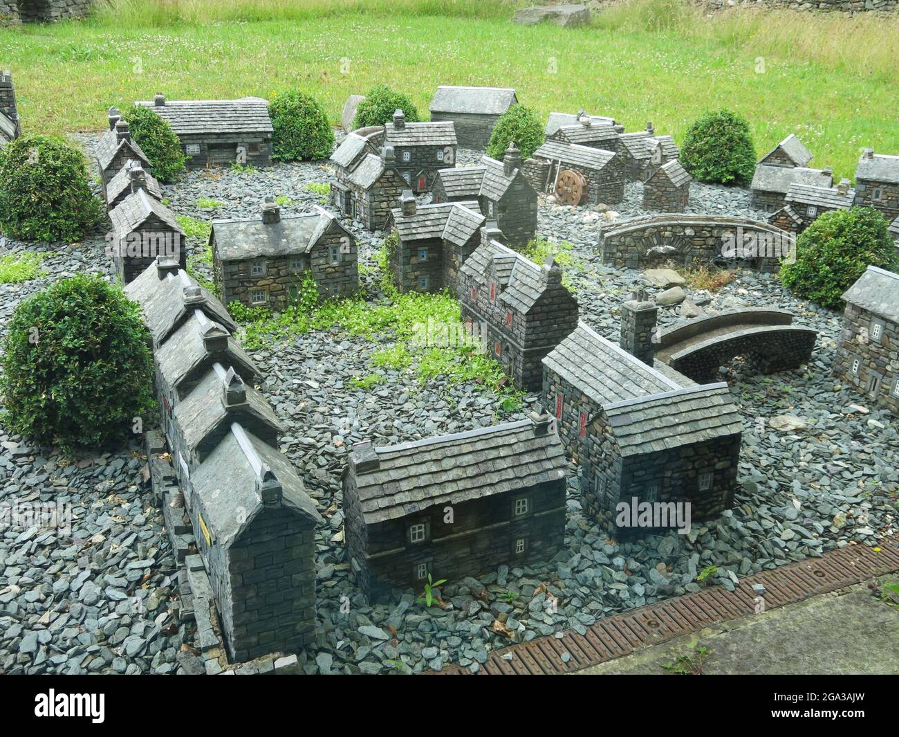 Quaint little model stone cottages of Lakeland stone & slate; part of ...