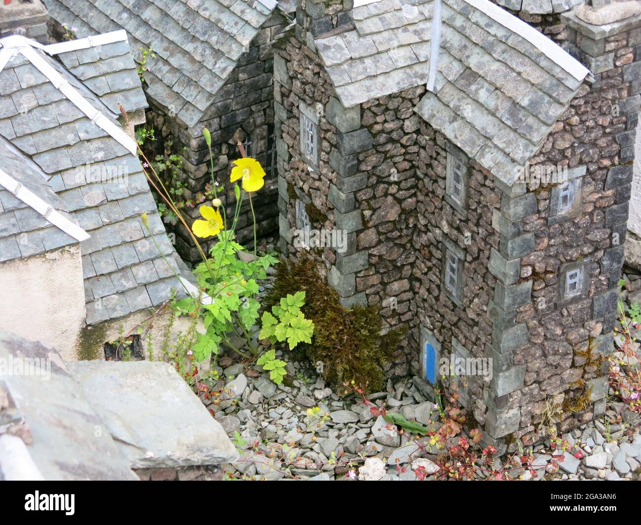 Quaint little model stone cottages of Lakeland stone & slate; part of ...
