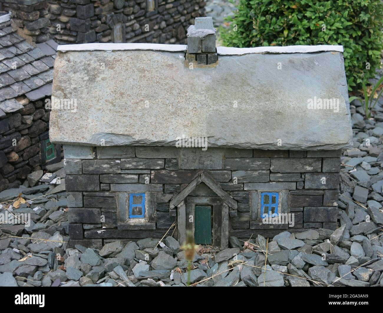 Quaint little model stone cottages of Lakeland stone & slate; part of ...