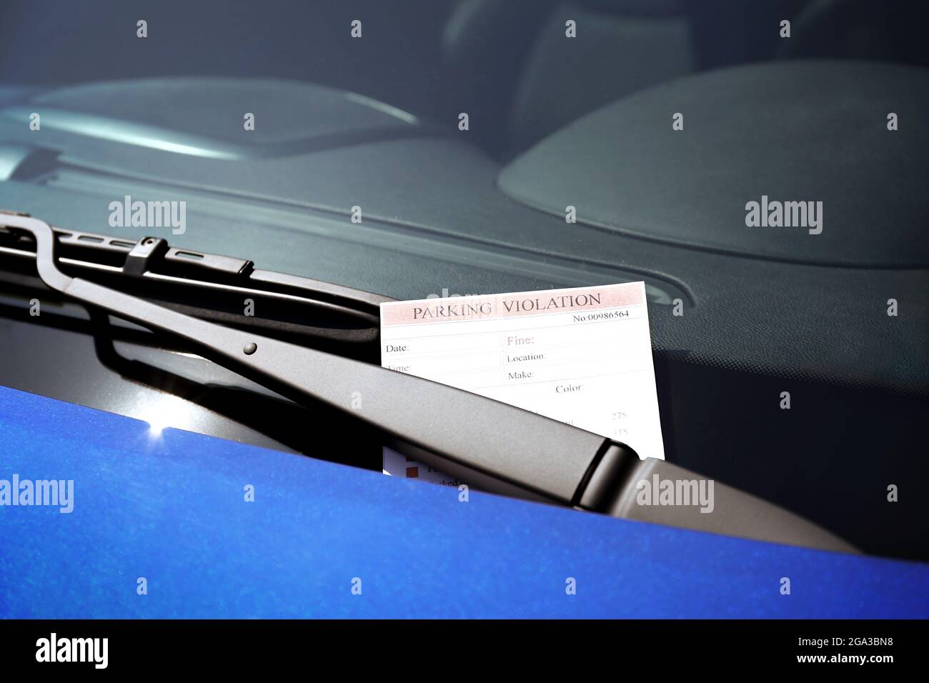 Parking violation ticket on car windshield, closeup Stock Photo - Alamy