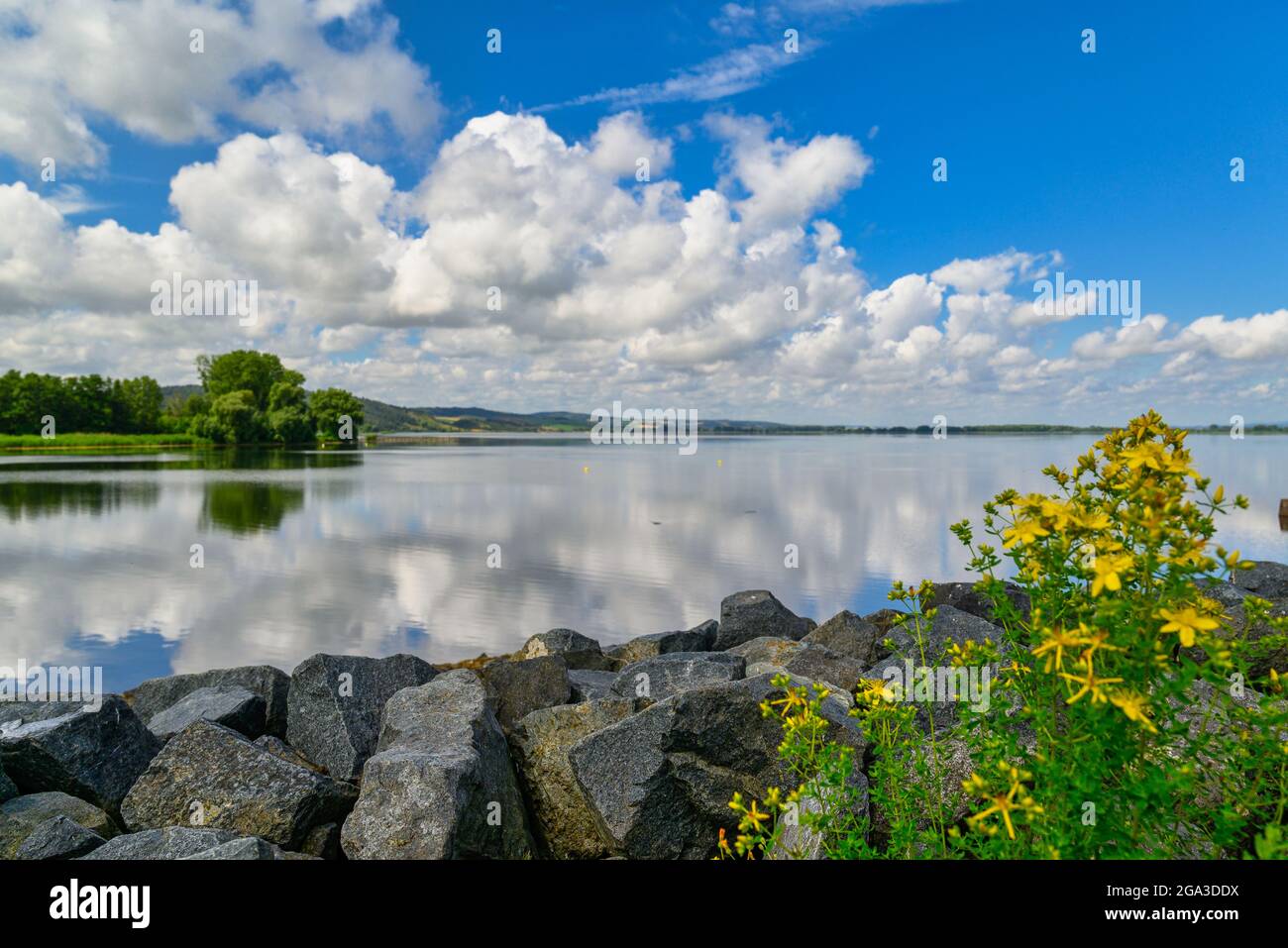 Beautiful view of a wonderful lake surrounded by rocks and reflections ...