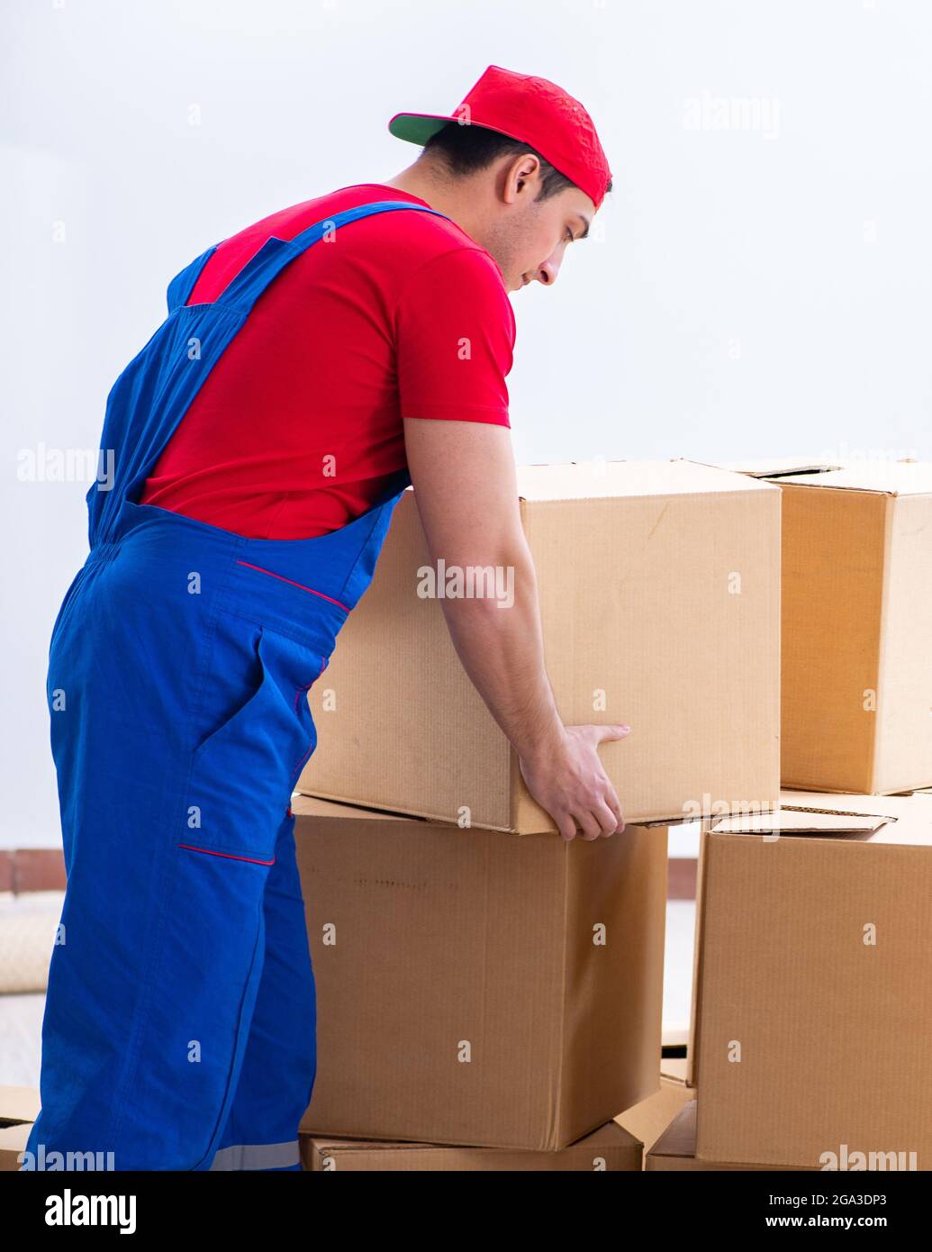The contractor worker moving boxes during office move Stock Photo - Alamy