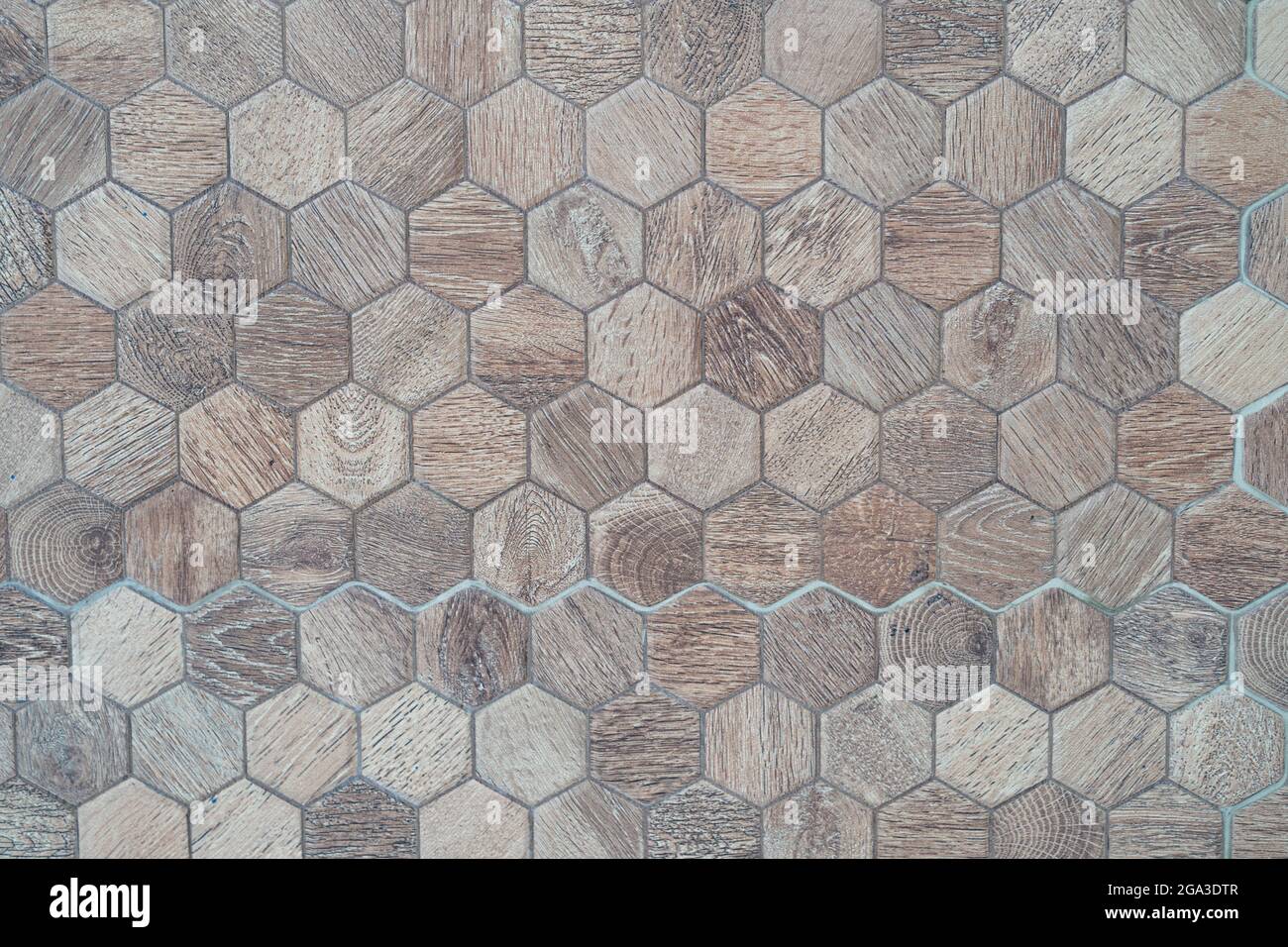 Hexagonal patterned stone wall surface Stock Photo - Alamy