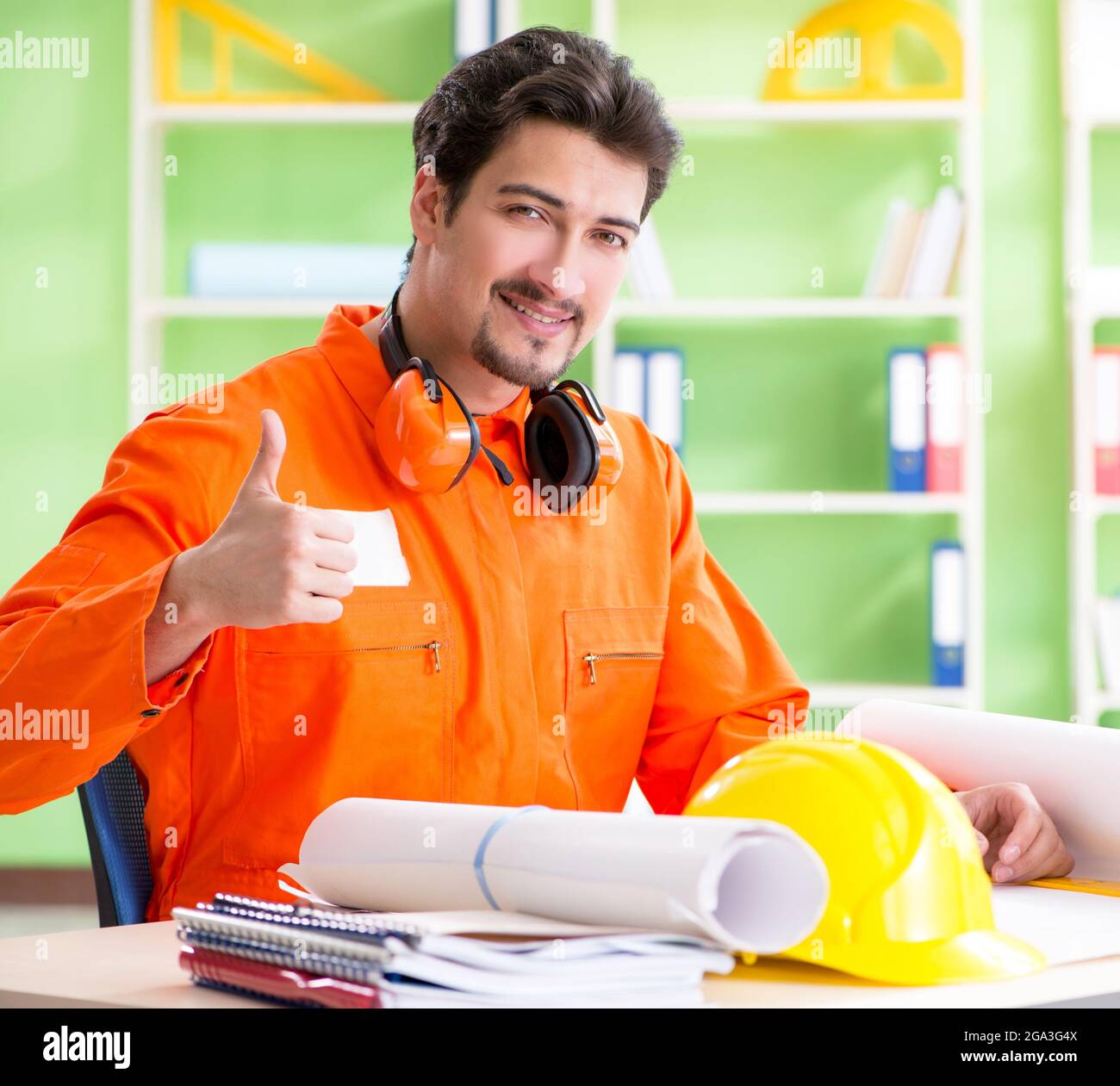 The construction supervisor planning new project in office Stock Photo ...