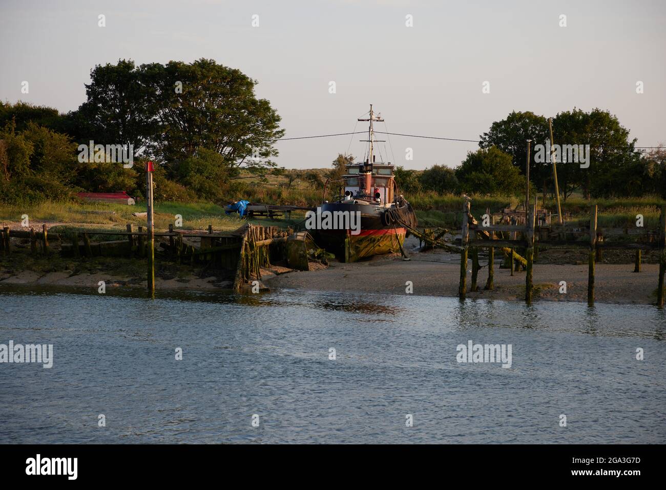 Boat in the process of being repaired Stock Photo - Alamy