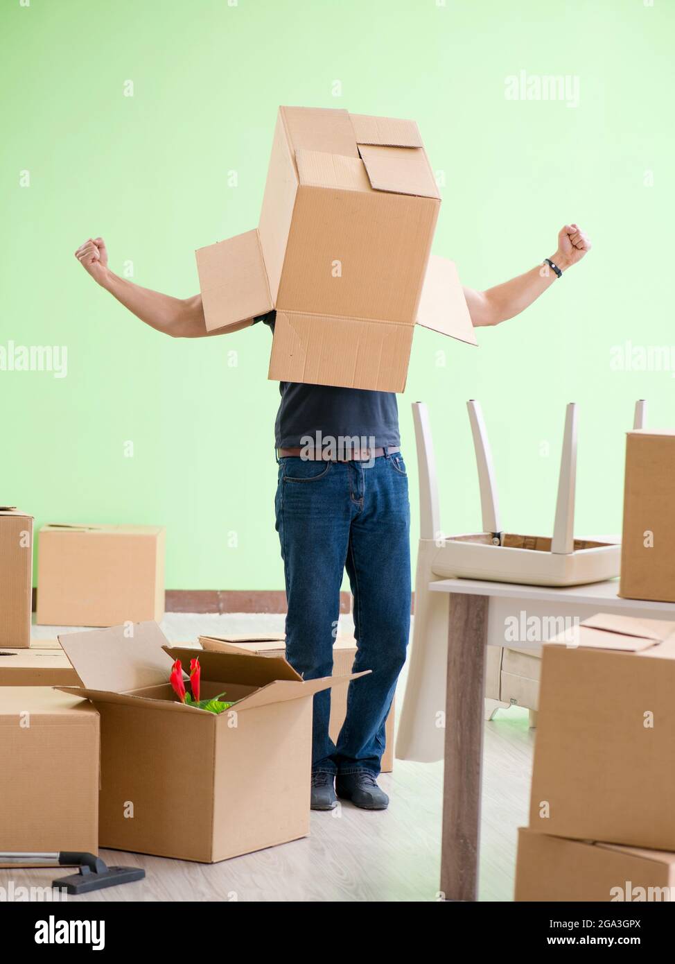 The man moving house with boxes Stock Photo - Alamy