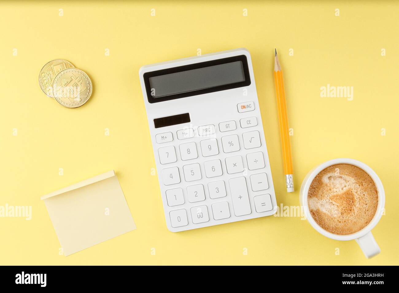 Office desktop concept with calculator Stock Photo - Alamy