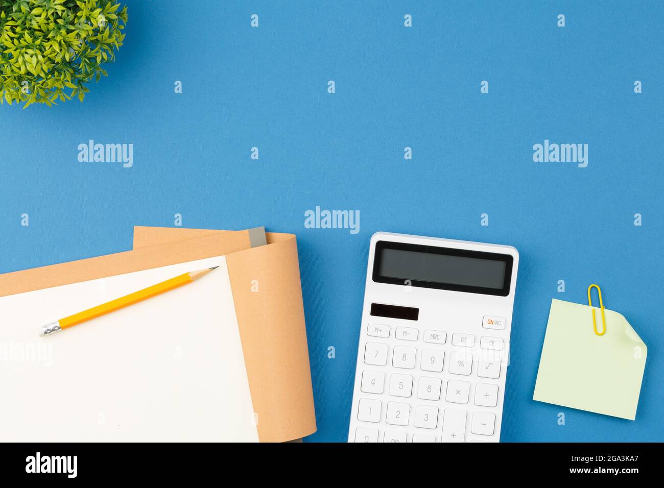 Notepad, pencil, calculator and note sheet Stock Photo - Alamy