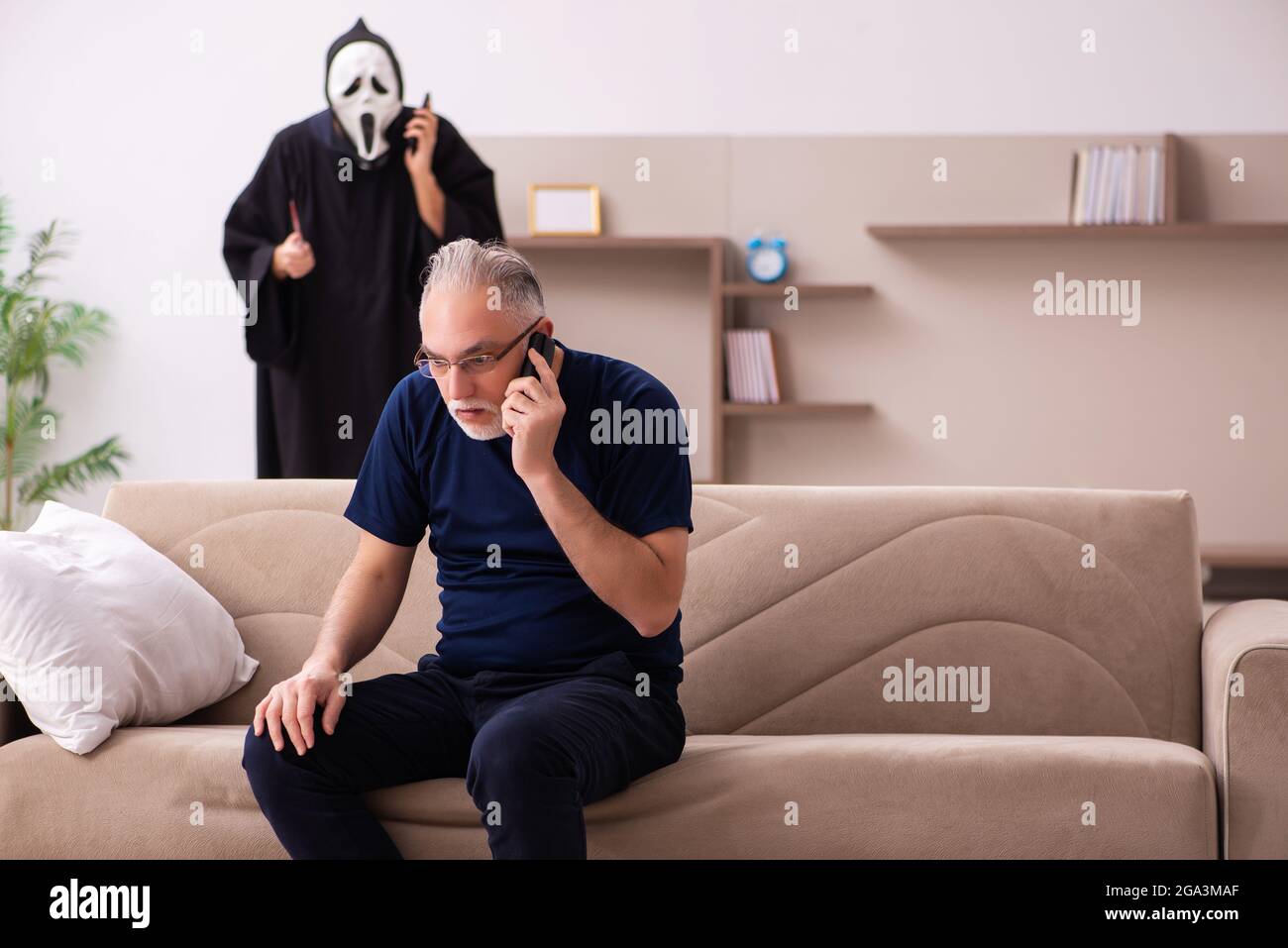 Devil coming to old dying man Stock Photo - Alamy