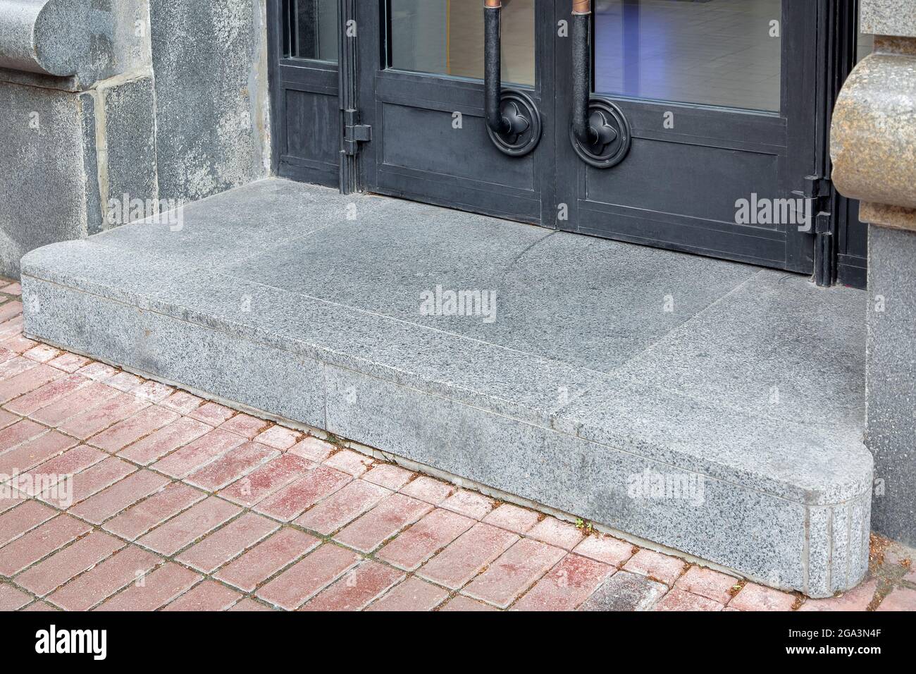 a threshold with a doorstep at the threshold entrance to the store with ...