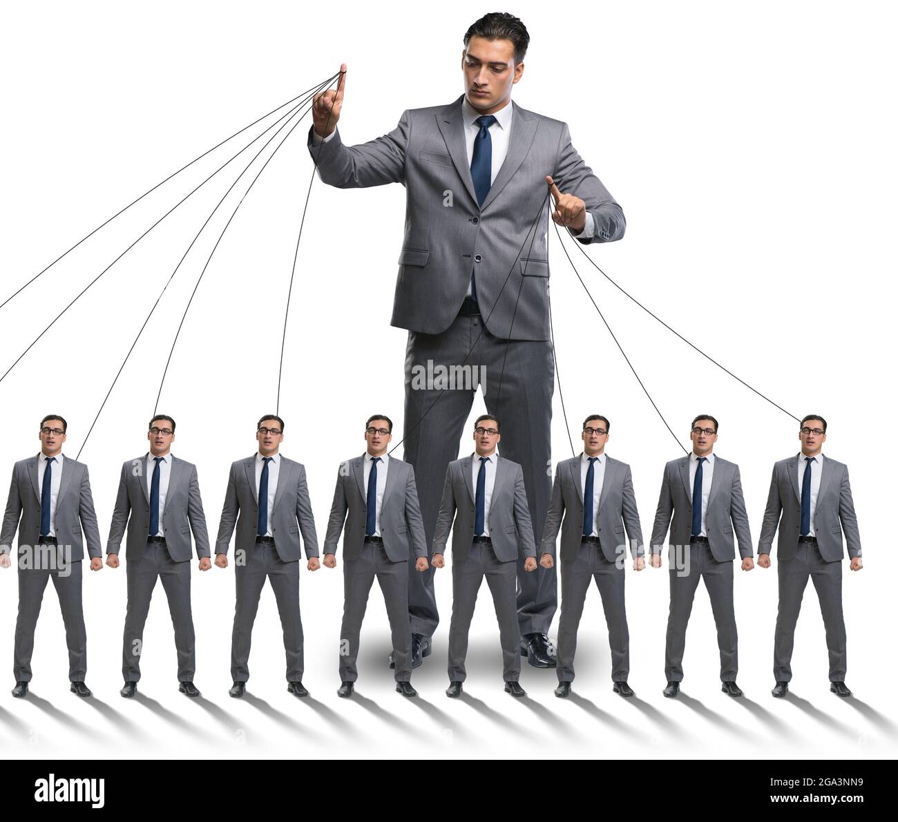 The boss employee manipulating his staff in business concept Stock ...
