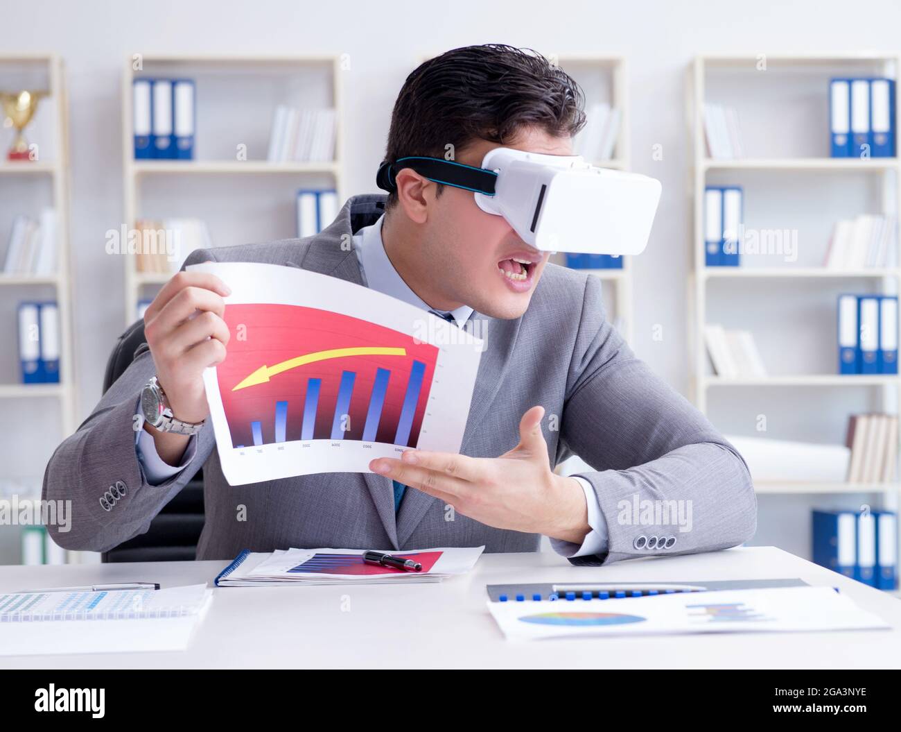 The businessman with virtual reality glasses in the office Stock Photo ...