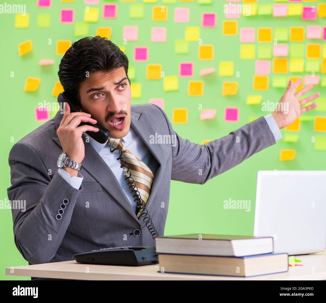 The businessman with many conflicting priorities Stock Photo - Alamy