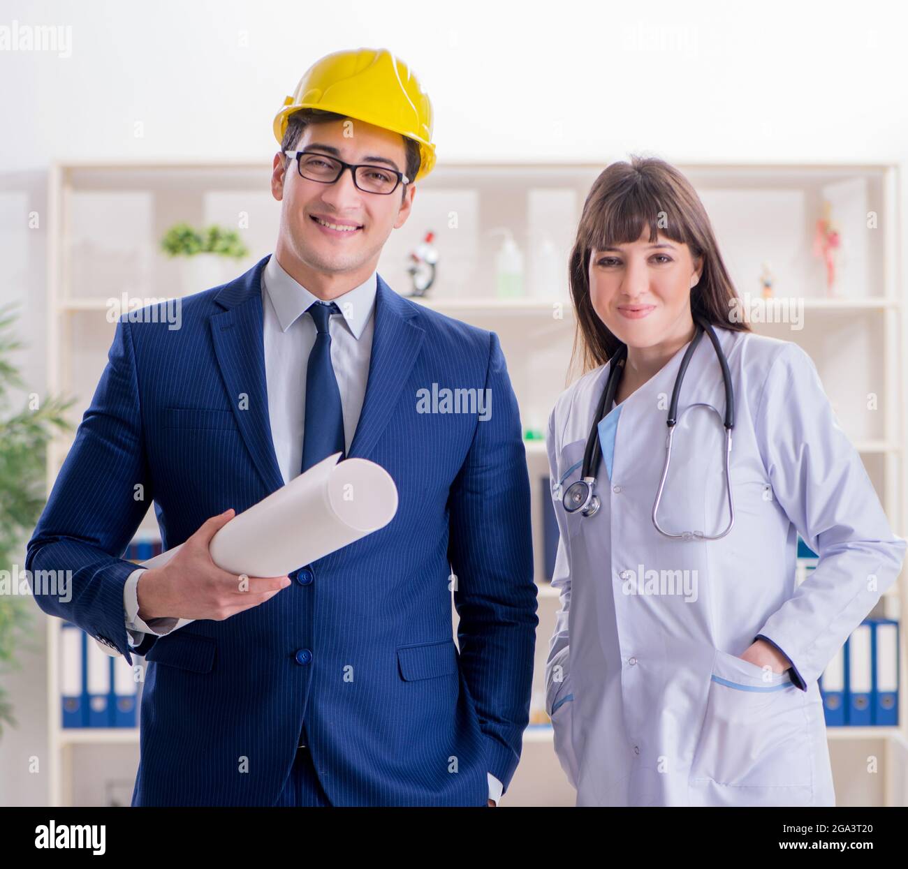 The doctor discussing new hospital plan with architect Stock Photo - Alamy
