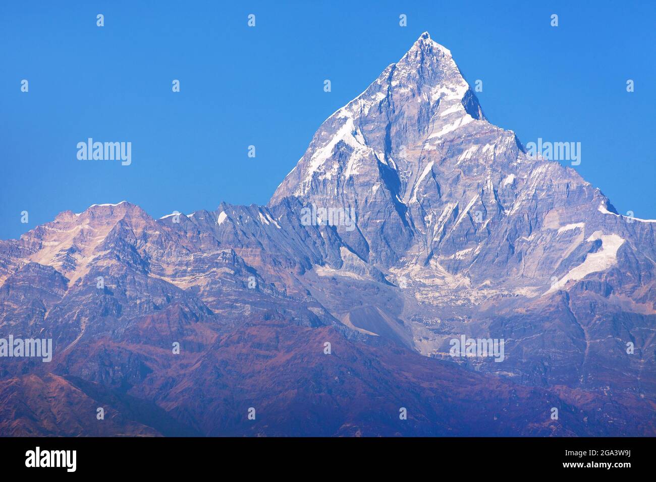 blue colored view of mount Machhapuchhare, Annapurna area, Nepal ...