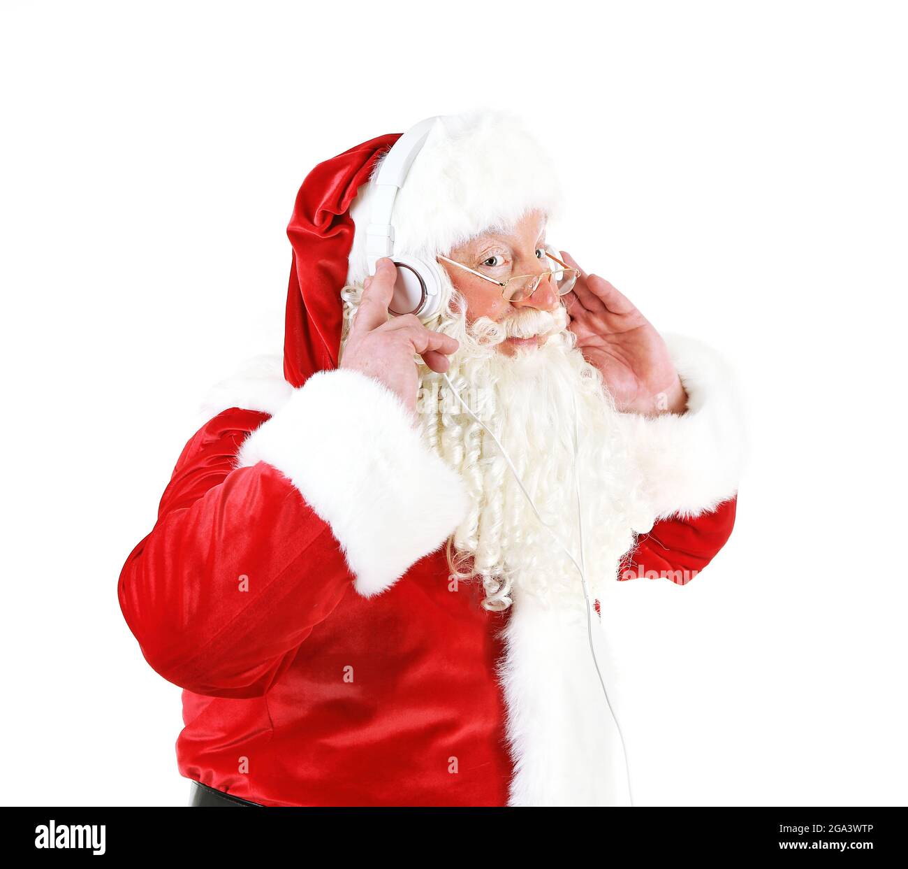 Santa Claus with headphones listening to music, isolated on white ...