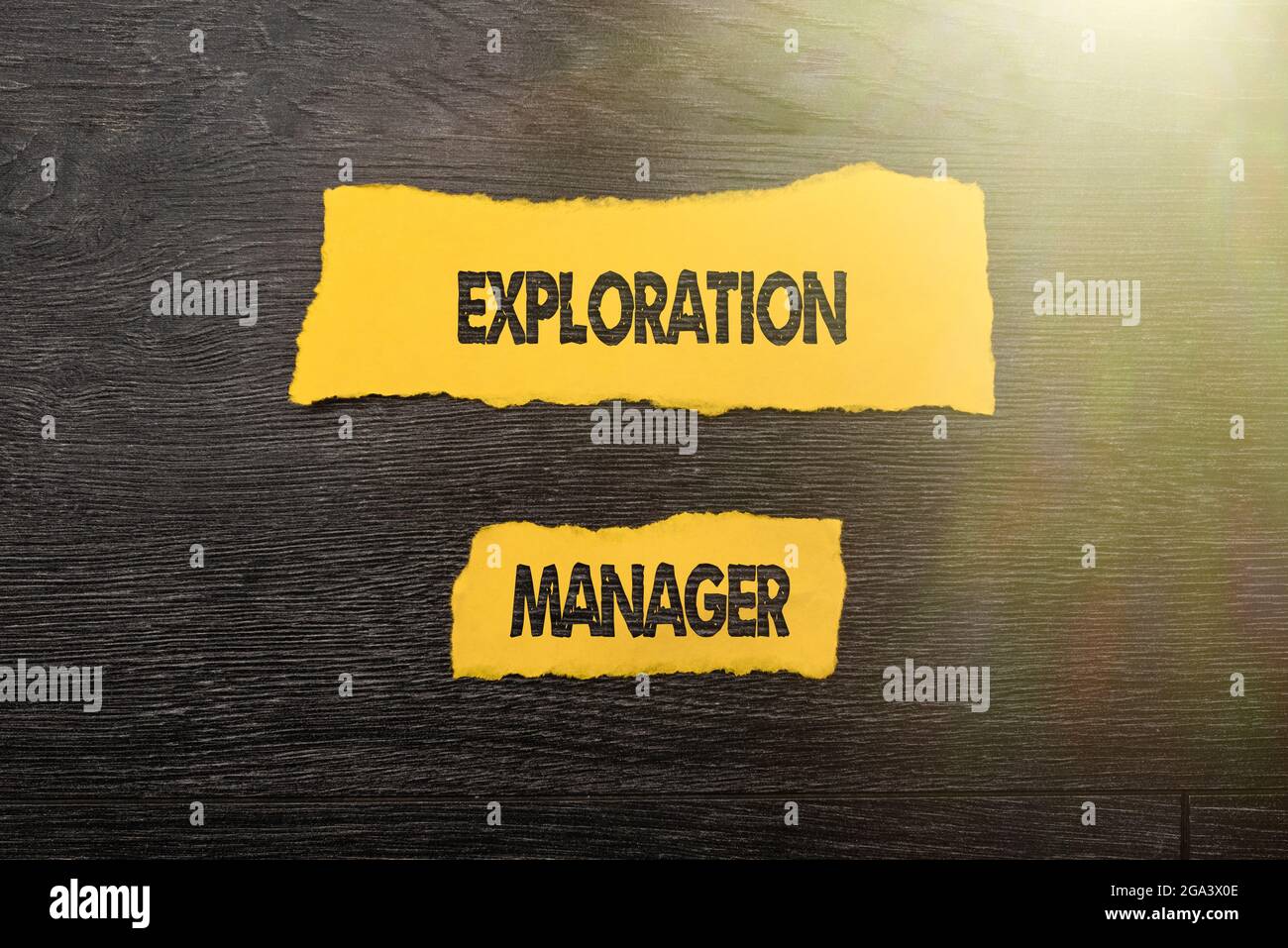 Hand writing sign Exploration Manager. Concept meaning lead and operate ...