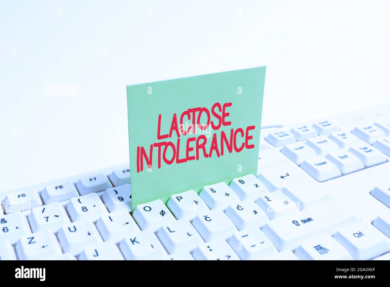 Text caption presenting Lactose Intolerance. Word for digestive problem ...