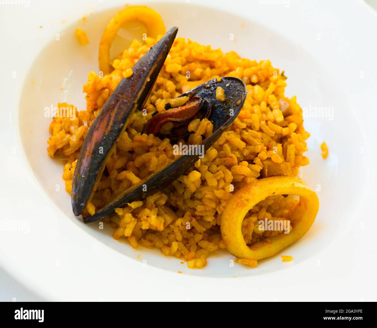 Tasty seafood dish - Paella a la marinera Stock Photo - Alamy