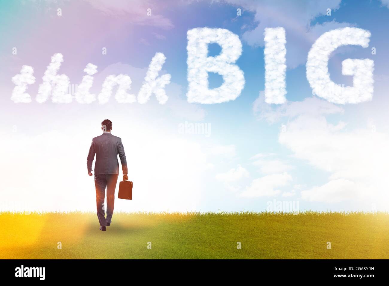 Think big concept with the businessman Stock Photo - Alamy