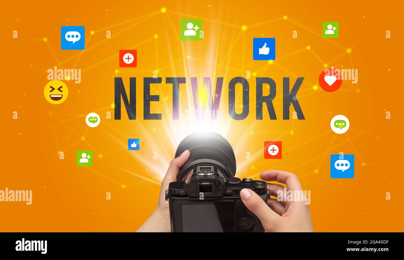 Using camera to capture social media content Stock Photo - Alamy