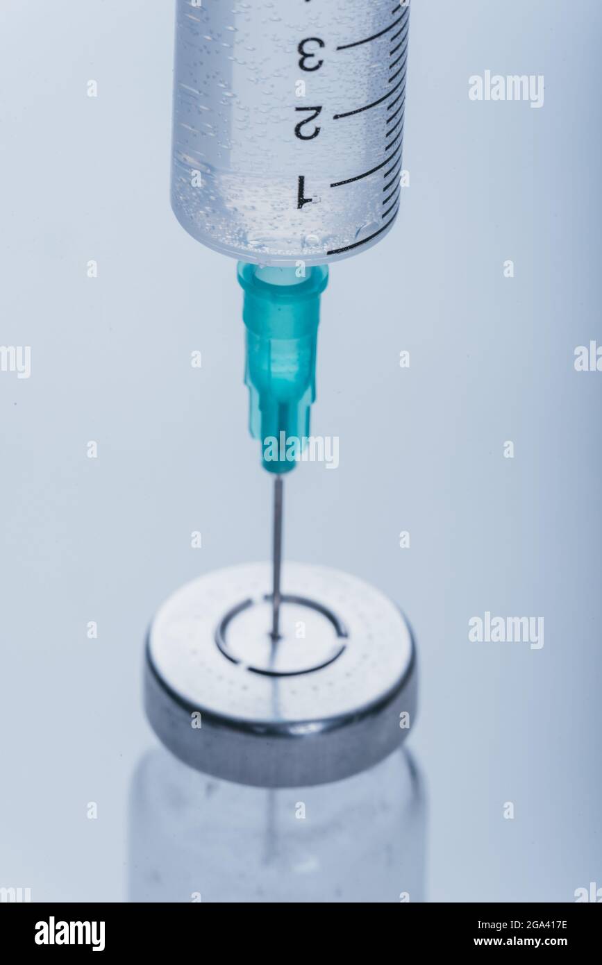 Medicine, Injection, vaccine and disposable syringe, drug concept ...