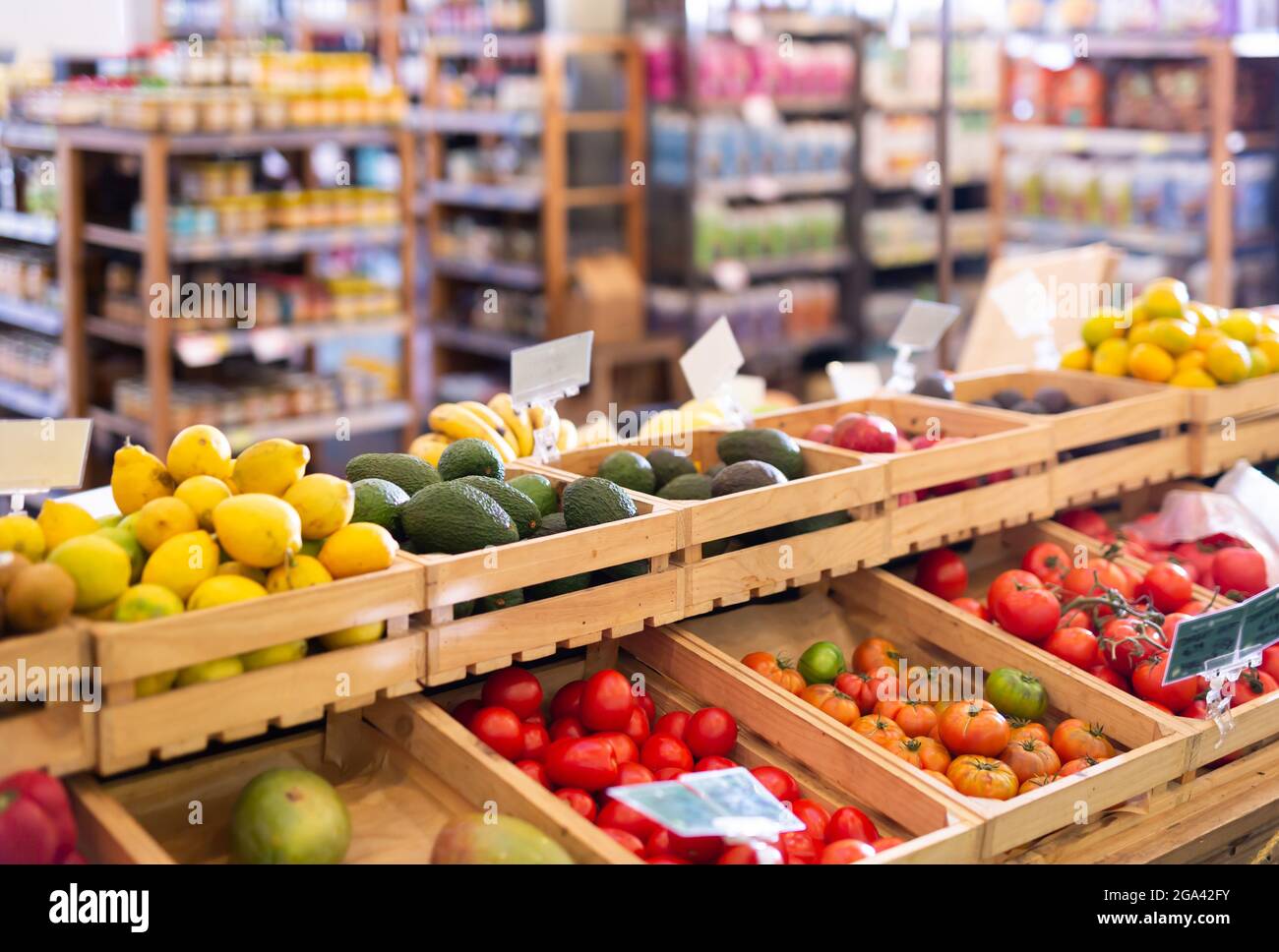 Fresh vegetables and fruits on counter in grocery supermarket Stock ...