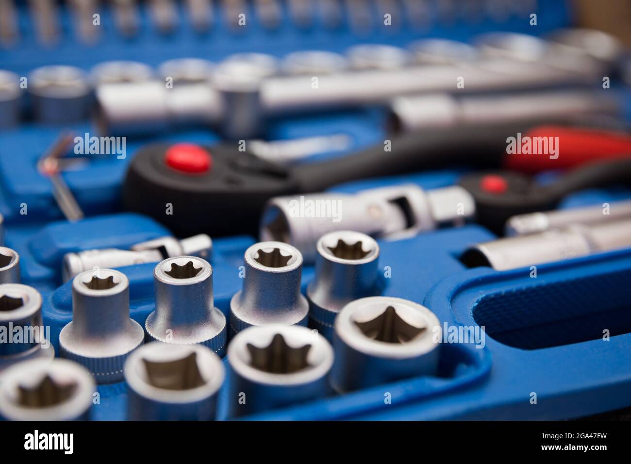 Sockets heads and other tools in the toolkit Stock Photo - Alamy