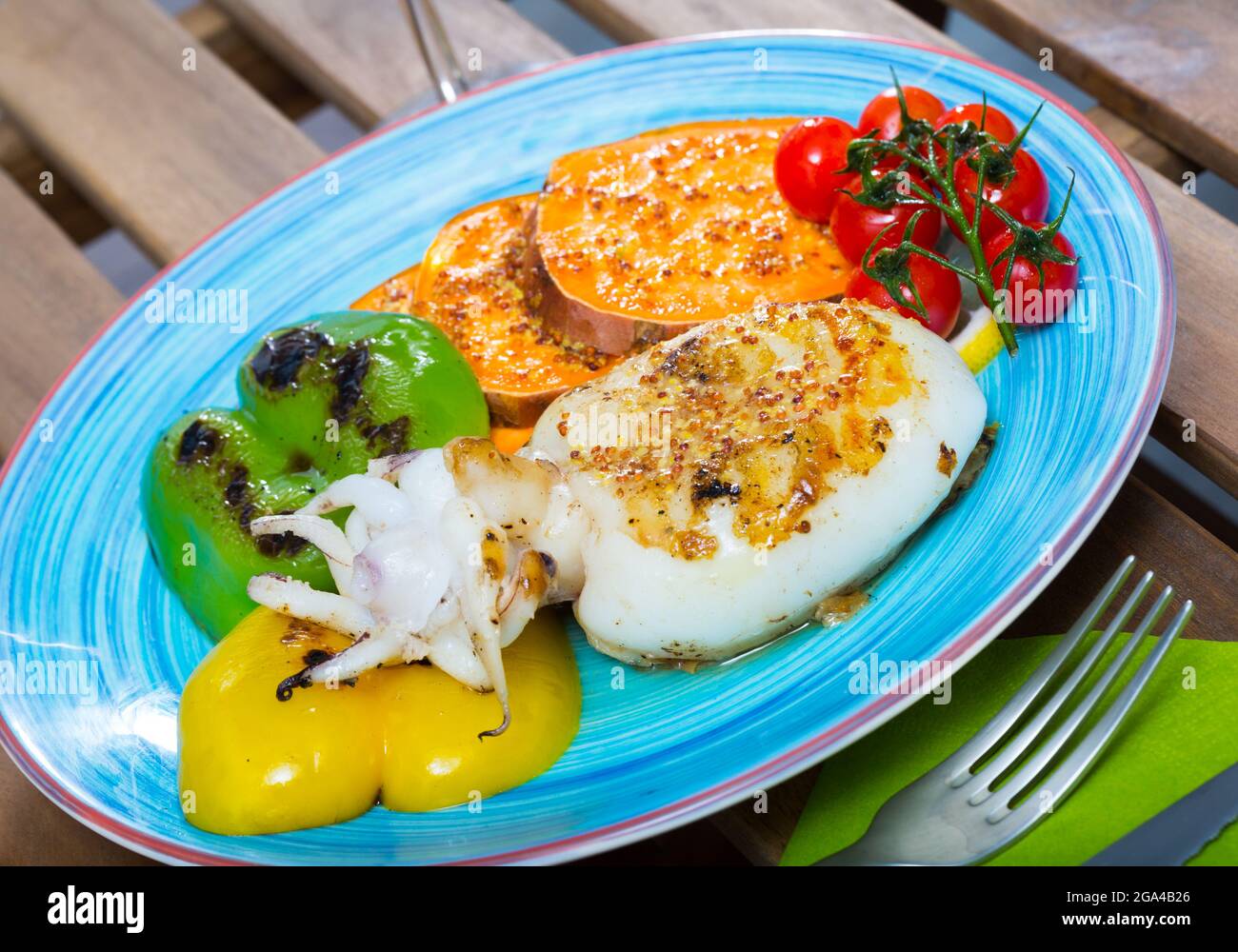 Photography of plate with sepia fried on a grill with pepper, boiled ...