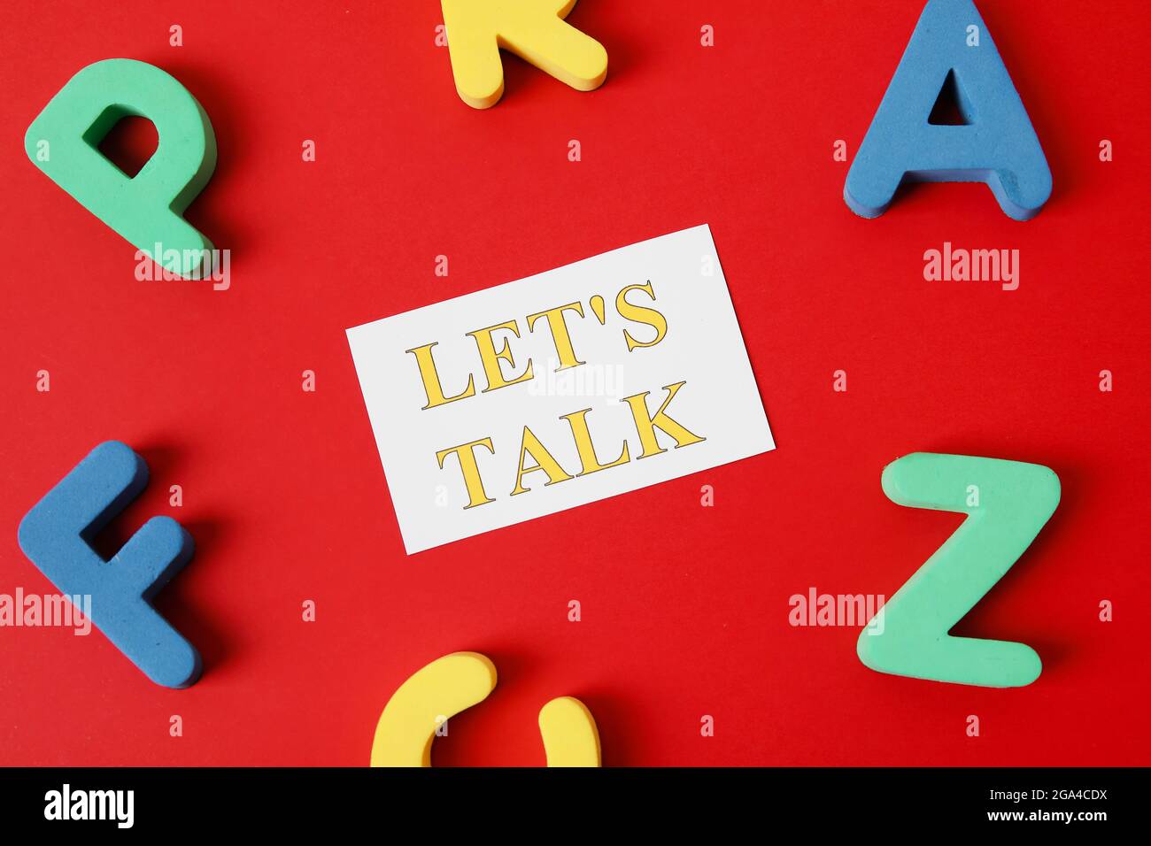 Paper with text LET'S TALK and letters on color background Stock Photo ...