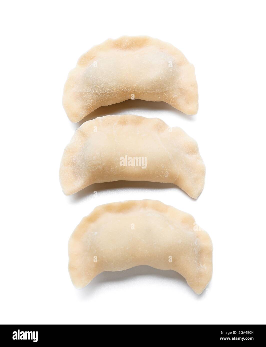 Raw dumplings on white background Stock Photo - Alamy