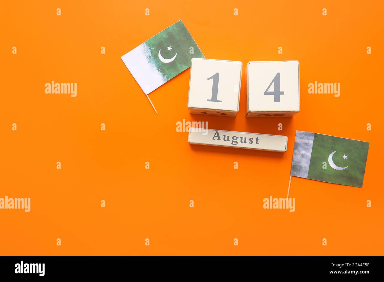 Flags of Pakistan and calendar with date of Independence Day on color ...