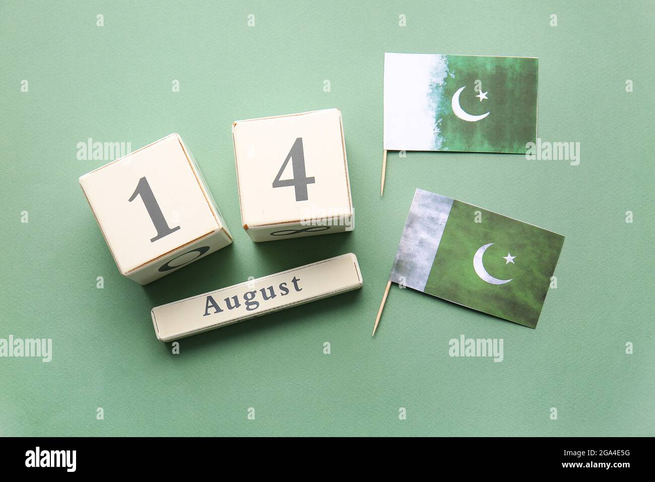 Flags of Pakistan and calendar with date of Independence Day on color ...
