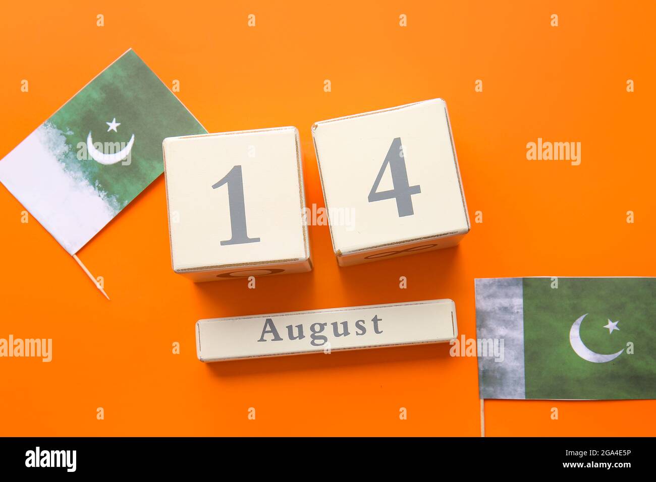 Flags of Pakistan and calendar with date of Independence Day on color ...