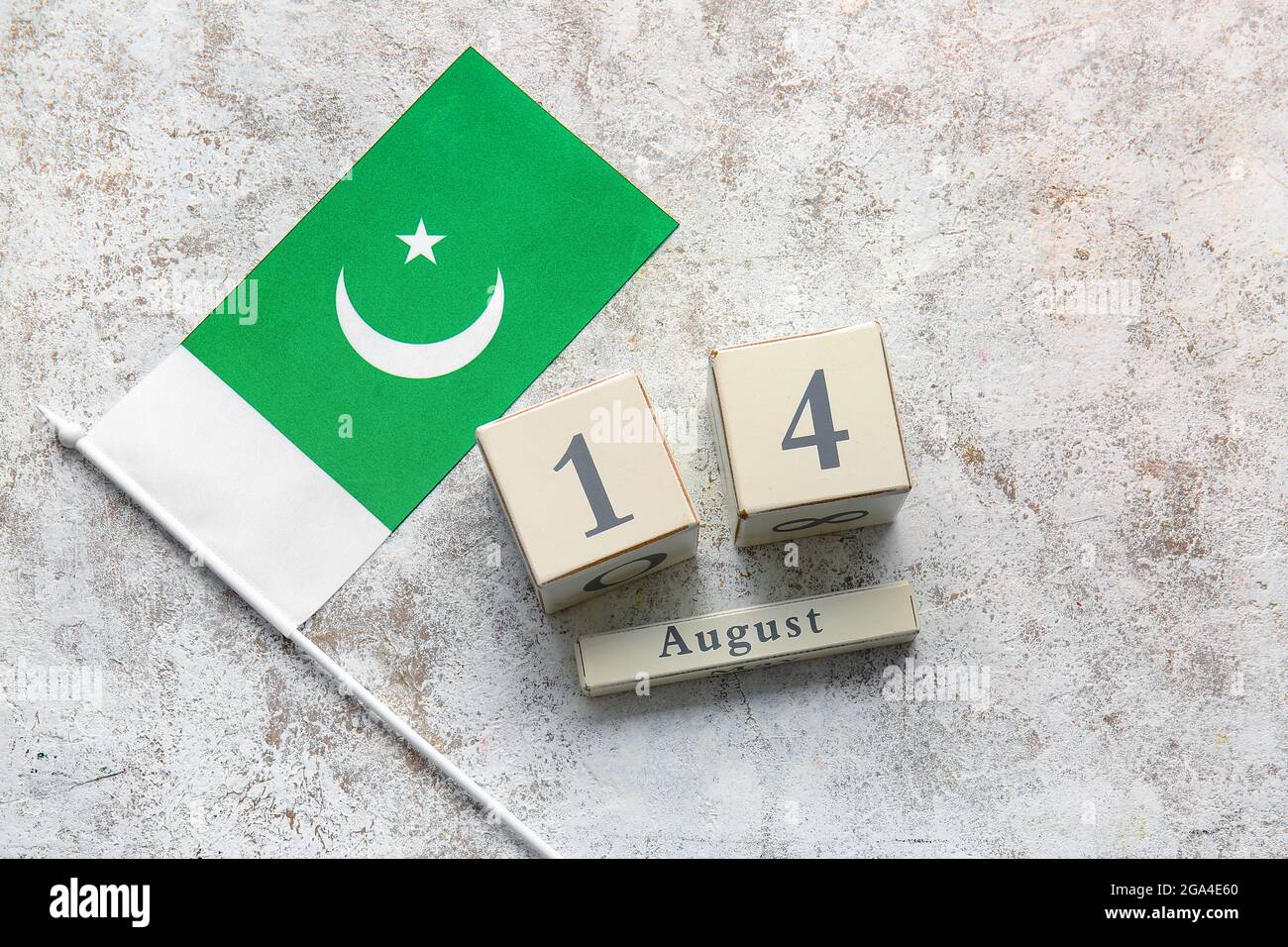 Flag of Pakistan and calendar with date of Independence Day on grunge ...