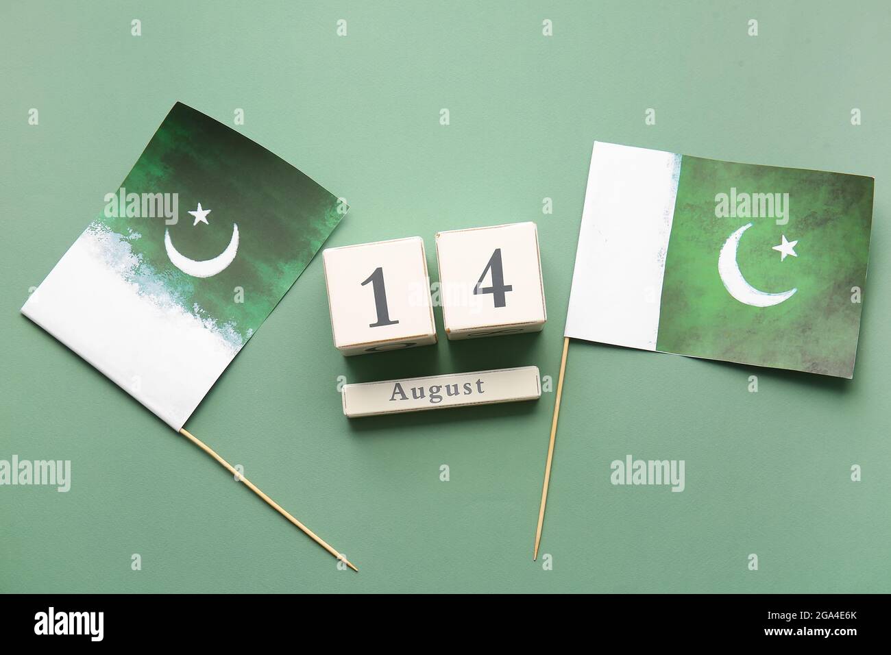 Flags of Pakistan and calendar with date of Independence Day on color ...