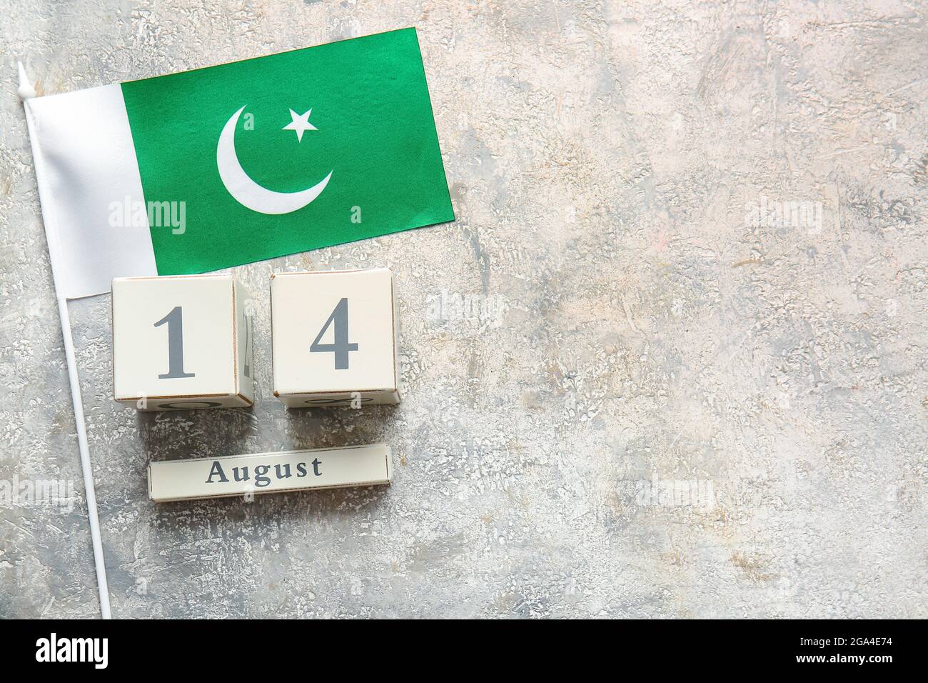 Flag of Pakistan and calendar with date of Independence Day on grunge ...