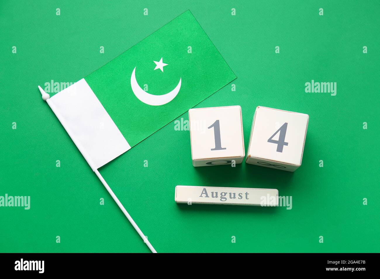 Flag of Pakistan and calendar with date of Independence Day on color ...