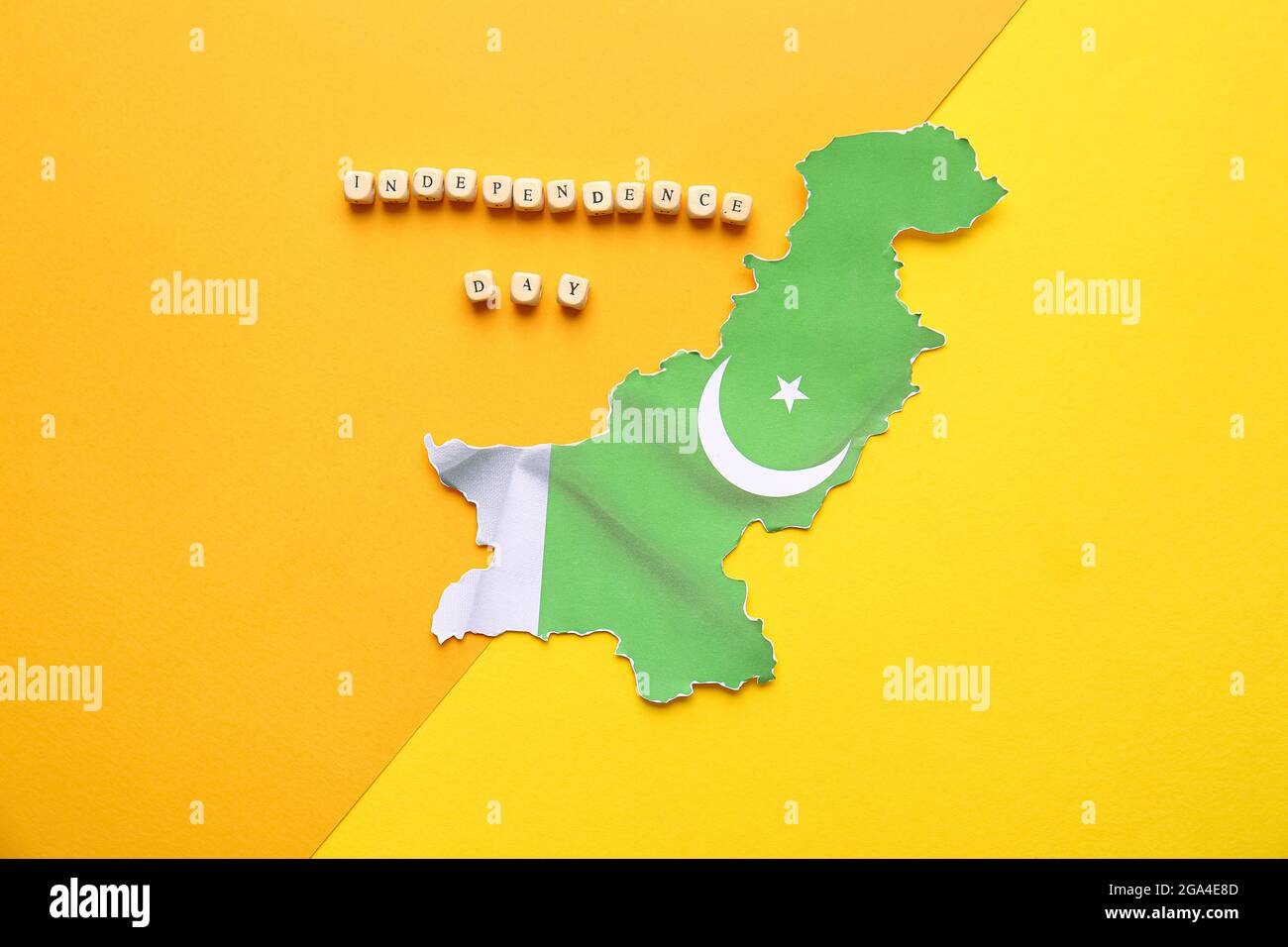 Flag map of Pakistan and text INDEPENDENCE DAY on color background ...