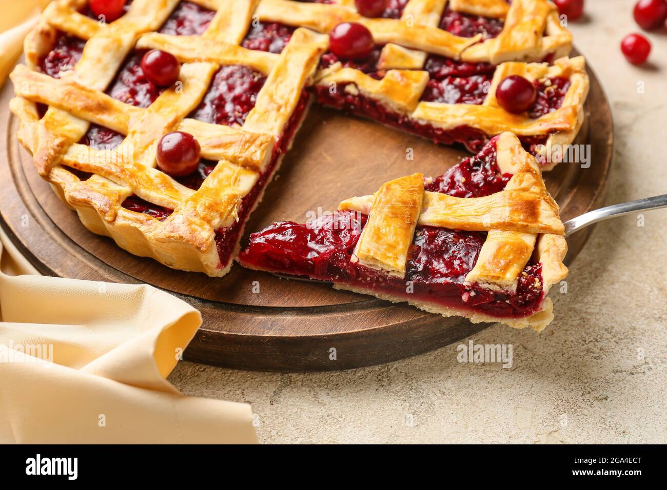 Board with tasty cherry pie on light background, closeup Stock Photo ...