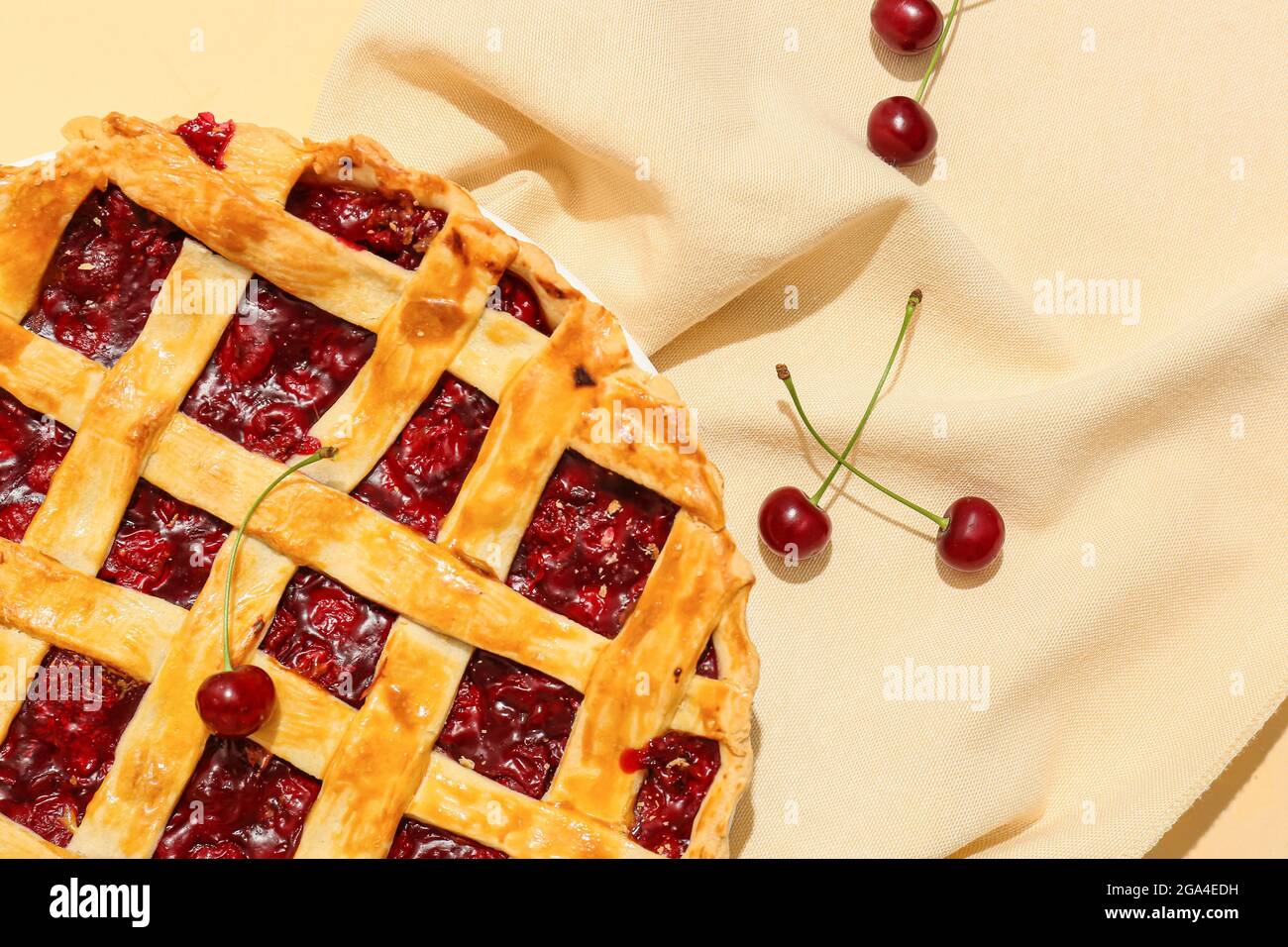 Tasty cherry pie on color background Stock Photo - Alamy