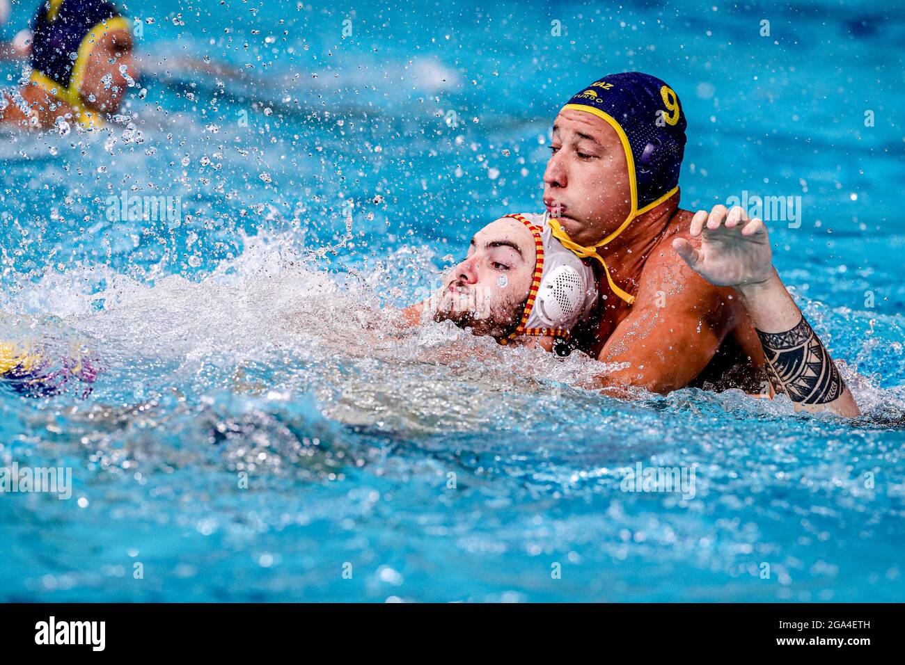 TOKYO, JAPAN - JULY 29: Roger Tahull of Spain, Rustam Ukumanov of ...