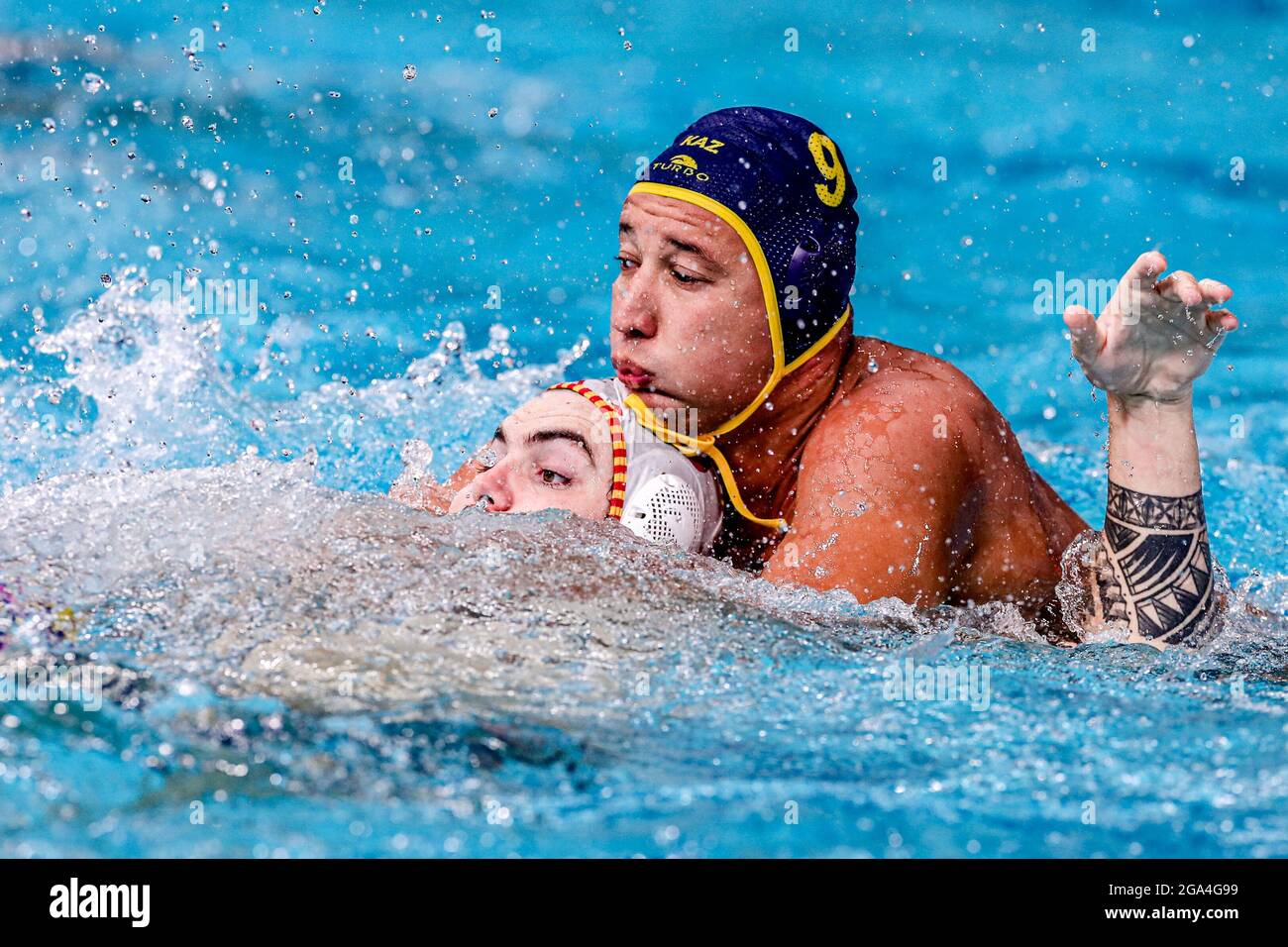TOKYO, JAPAN - JULY 29: Roger Tahull of Spain, Rustam Ukumanov of ...