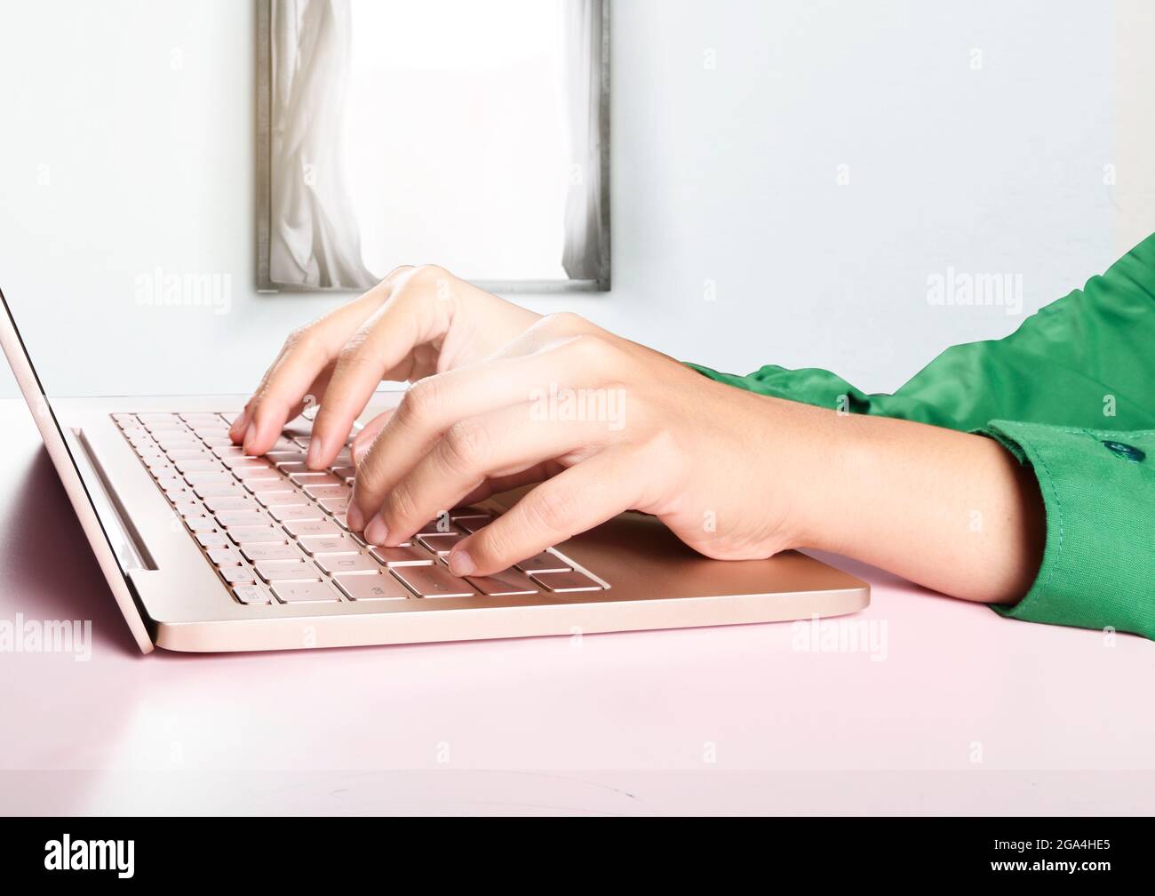 College students typing on a laptop at home. Back to School concept ...