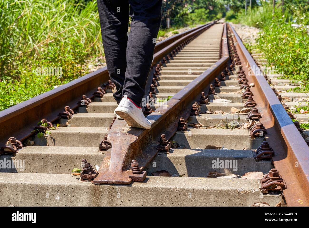 Couple walking on railroad tracks hi-res stock photography and images ...