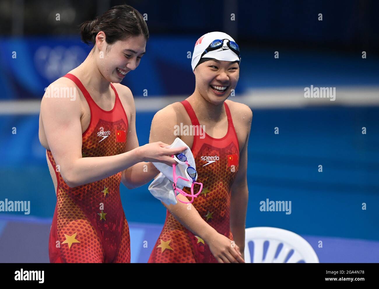 Tokyo, Japan. 29th July, 2021. Zhang Yufei (L) of China talks with ...